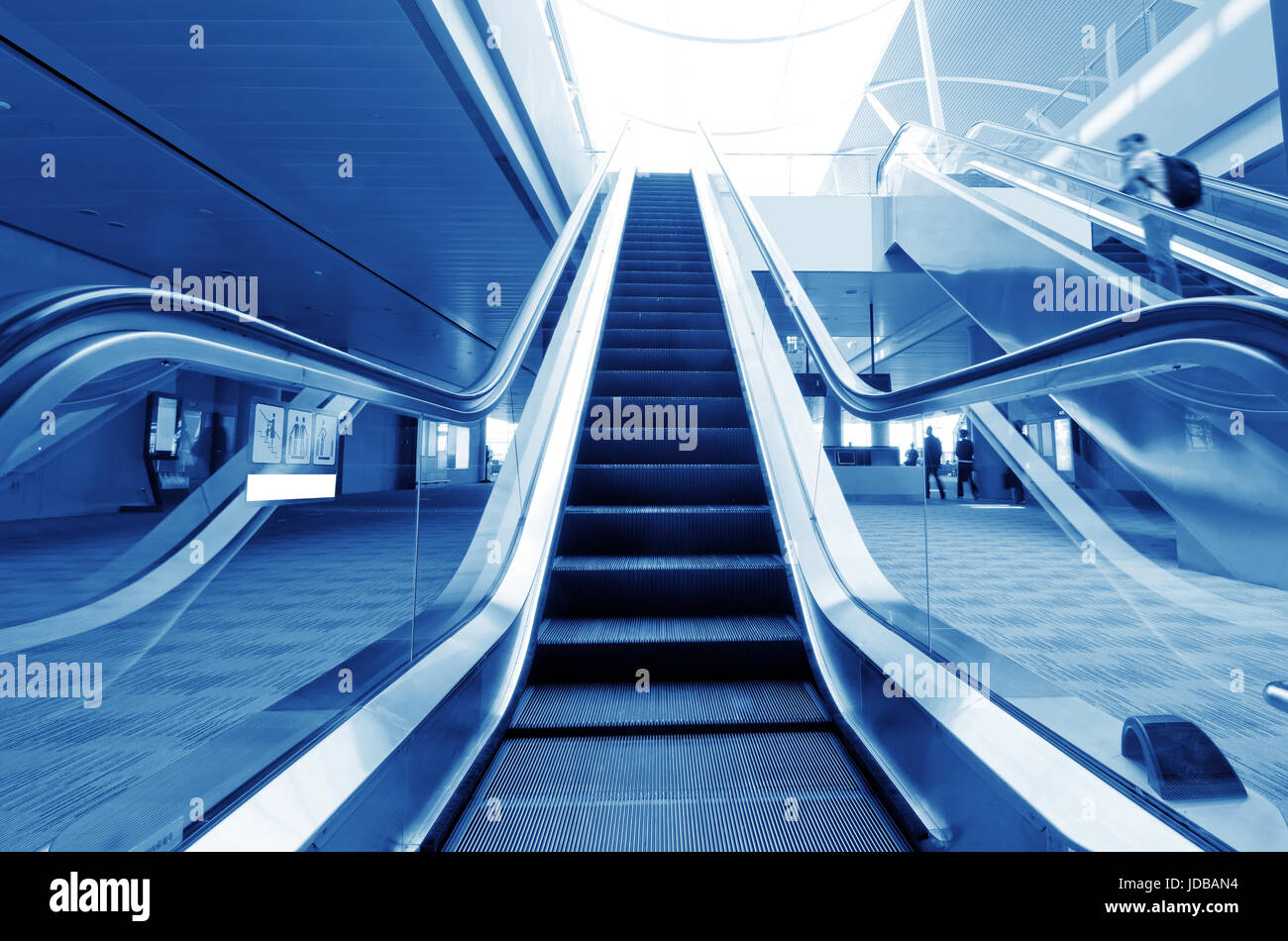 Escalator ,interior of the shanghai pudong airport Stock Photo - Alamy