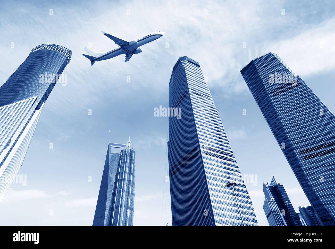 Shanghai aircraft on the sky Stock Photo - Alamy