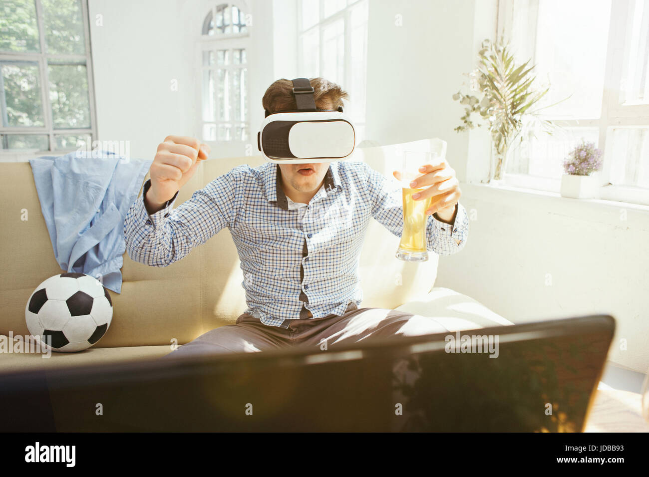 The man with glasses of virtual reality at home. Future technology ...