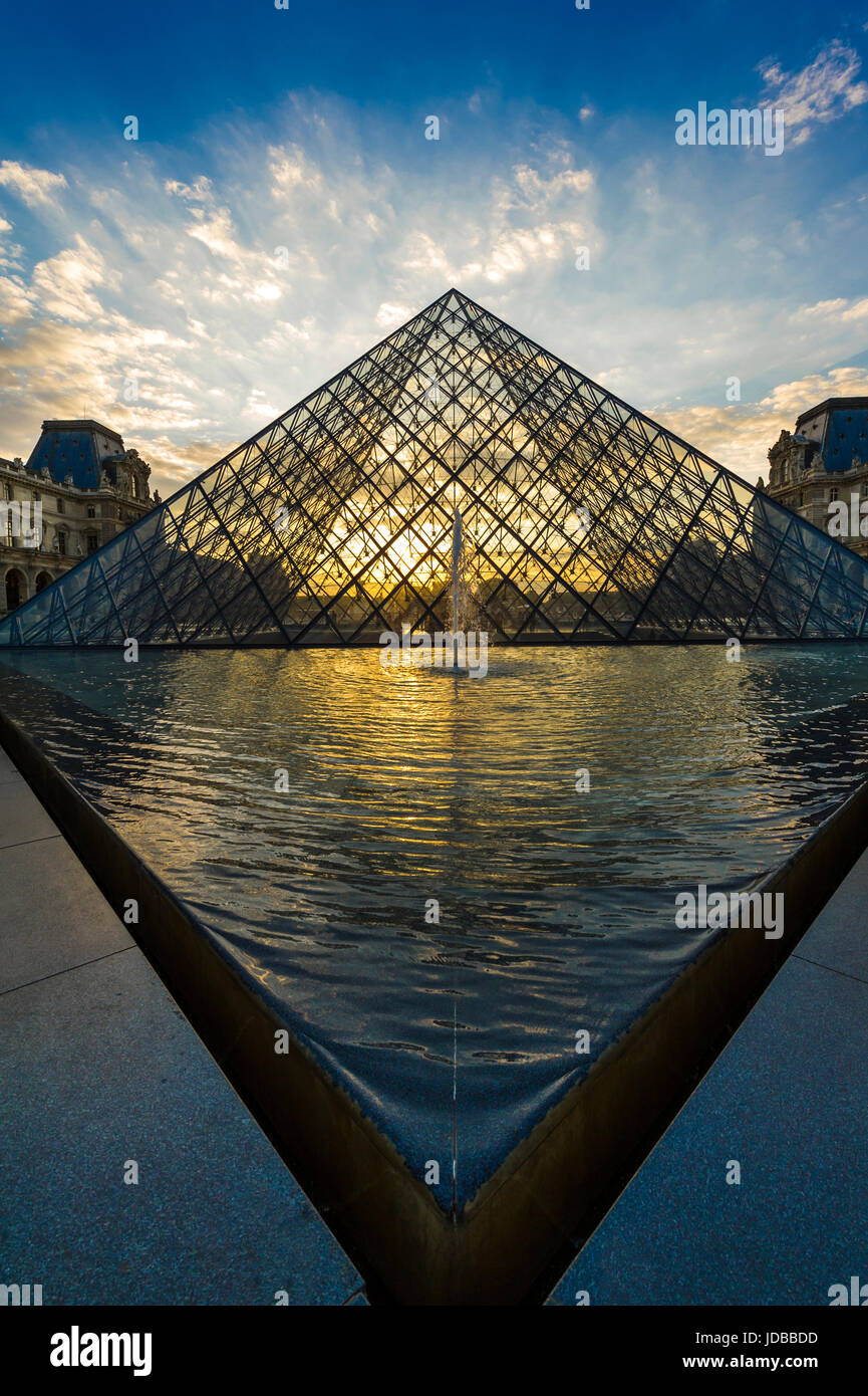 Louvre Pyramid at sunset Stock Photo - Alamy