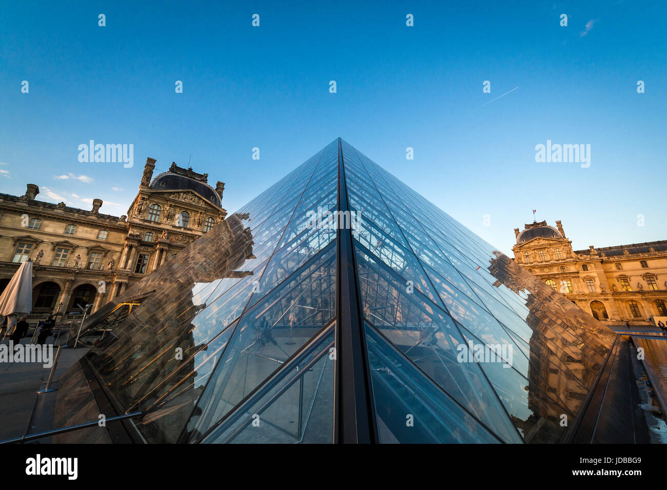 Louvre Pyramid at sunset Stock Photo - Alamy