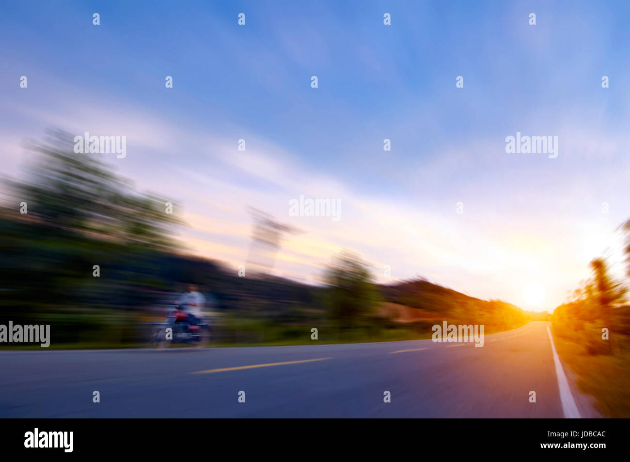 Sunrise, the endless road, and occasionally see a car roaring past ...