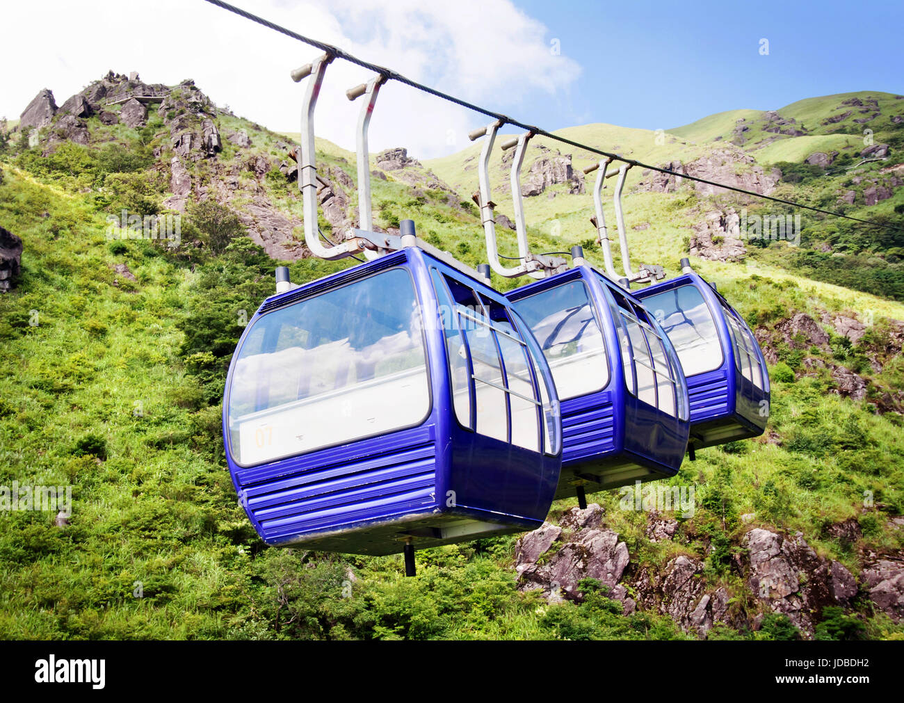 Cable car in the mountains Stock Photo - Alamy