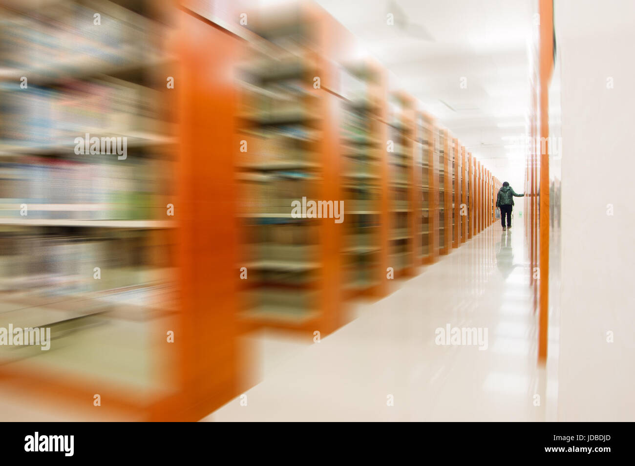 Library shelves, a large number of books Stock Photo - Alamy