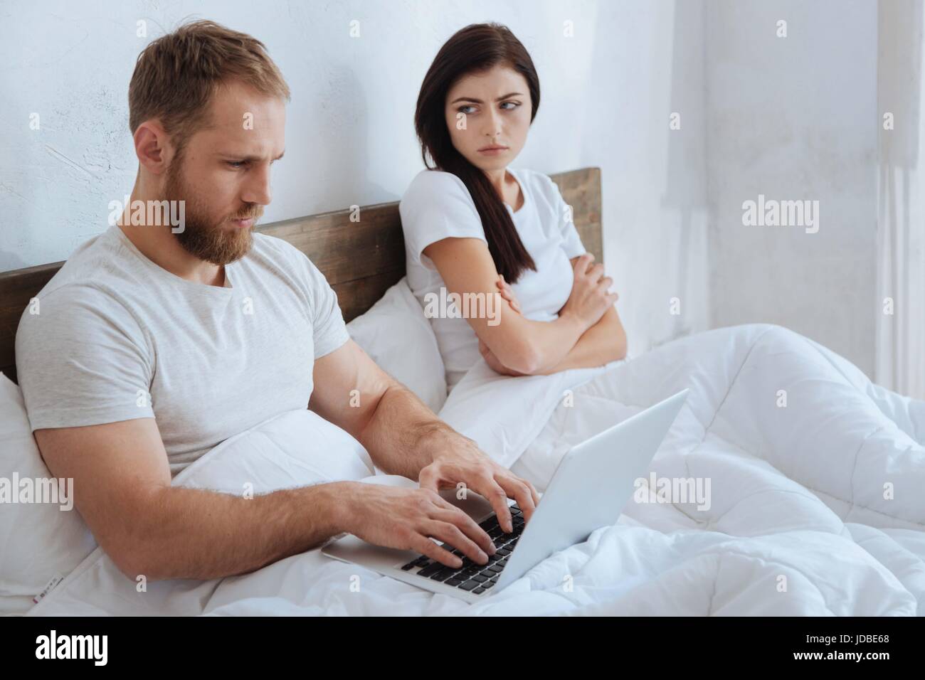 Man ignoring girlfriend laptop hi-res stock photography and images - Alamy