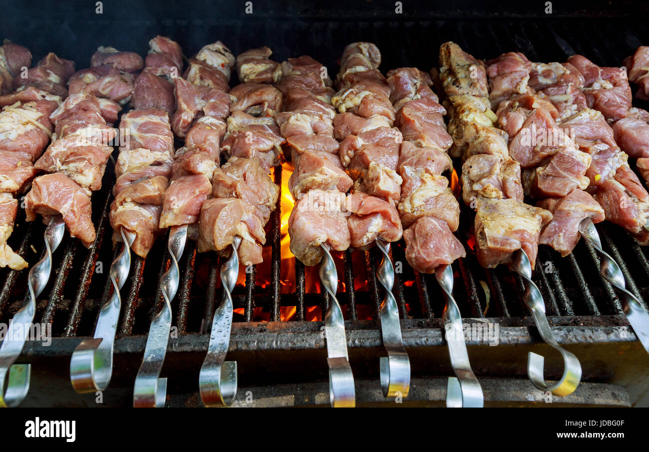 Preparing bbq grill outdoor party hi-res stock photography and images ...