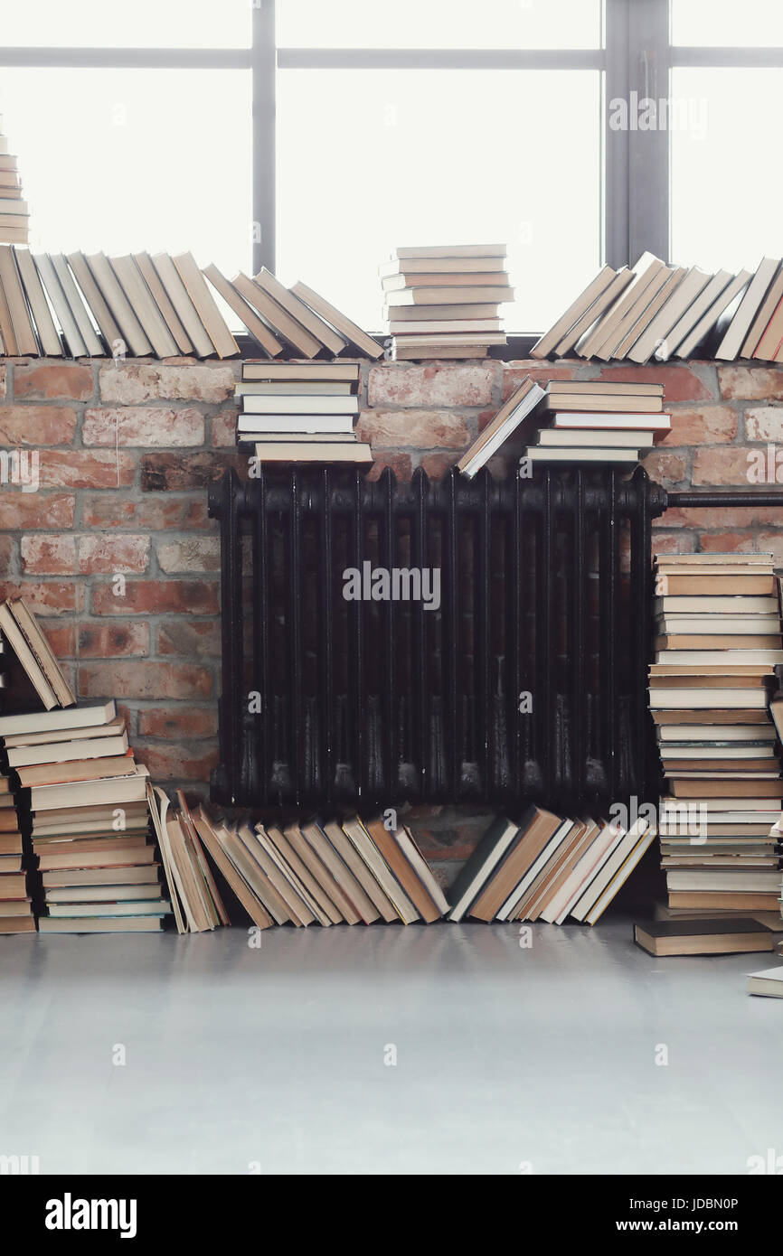 Library. Pile of books indoor Stock Photo - Alamy