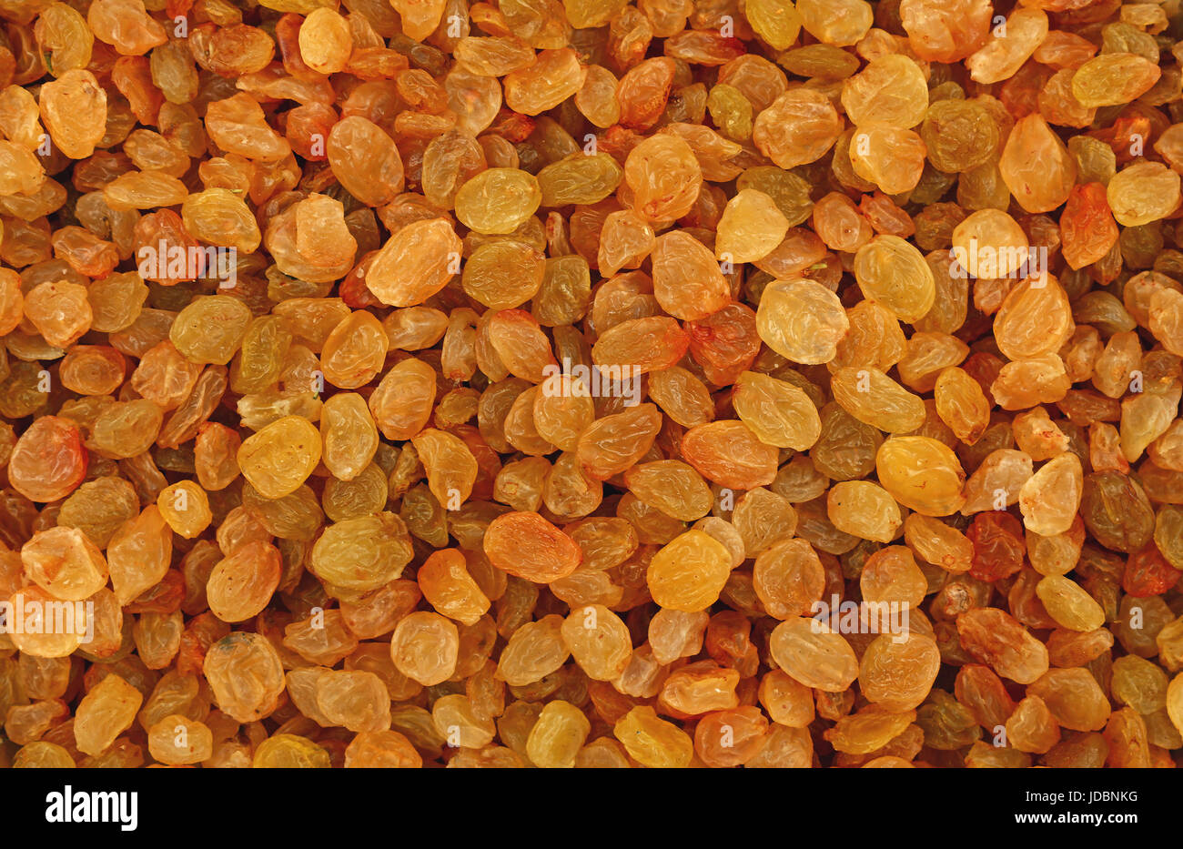 White grape small yellow sundried raisin close up background Stock ...