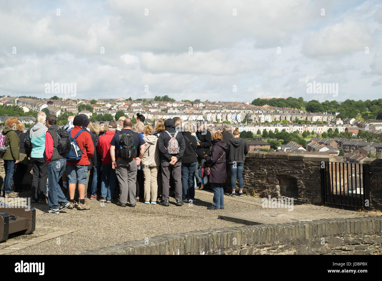 Tourists and tour guide on the Derry City Walls Derry Londonderry ...
