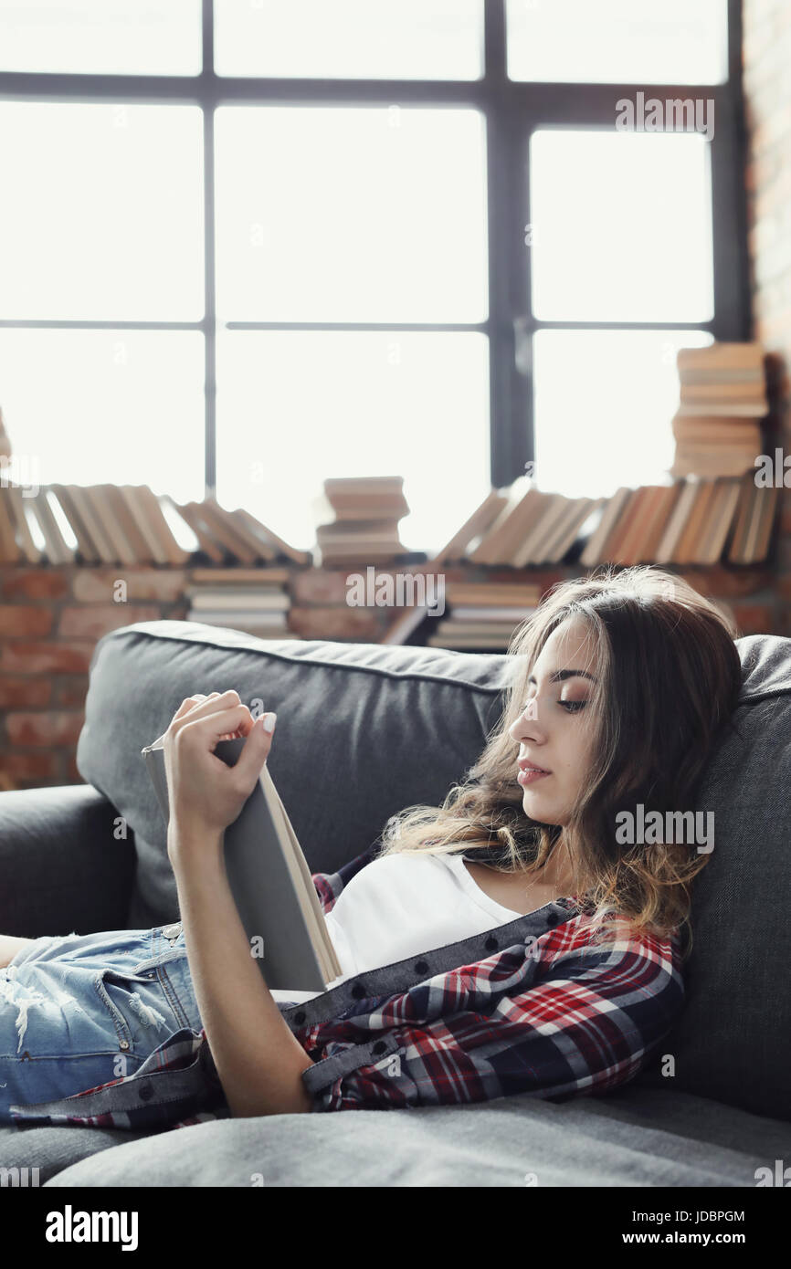 Education and books. Lovely woman in the library Stock Photo - Alamy