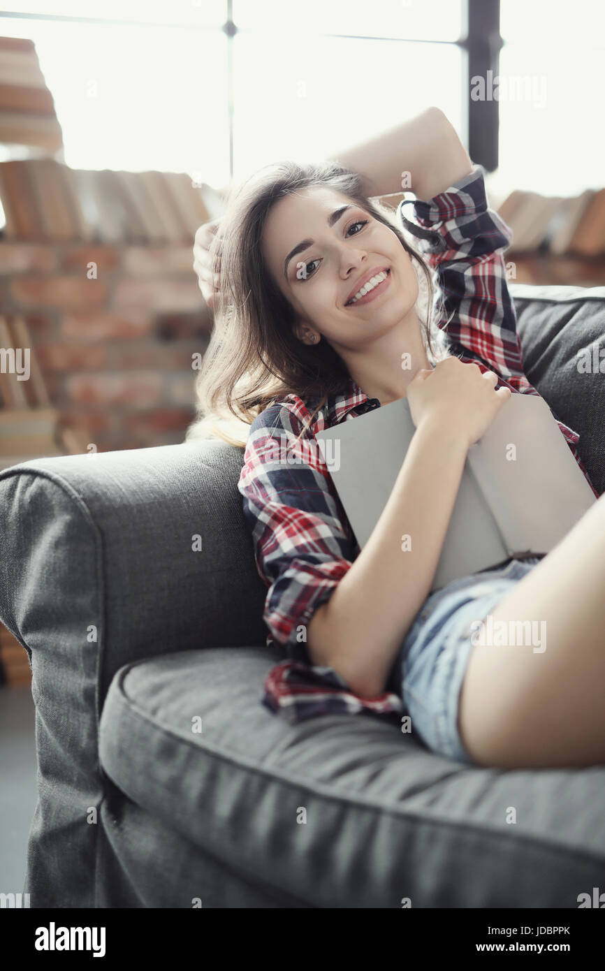 Education and books. Lovely woman in the library Stock Photo - Alamy