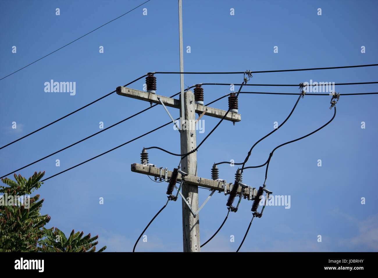Closeup Eletricity line in blue sky Stock Photo - Alamy