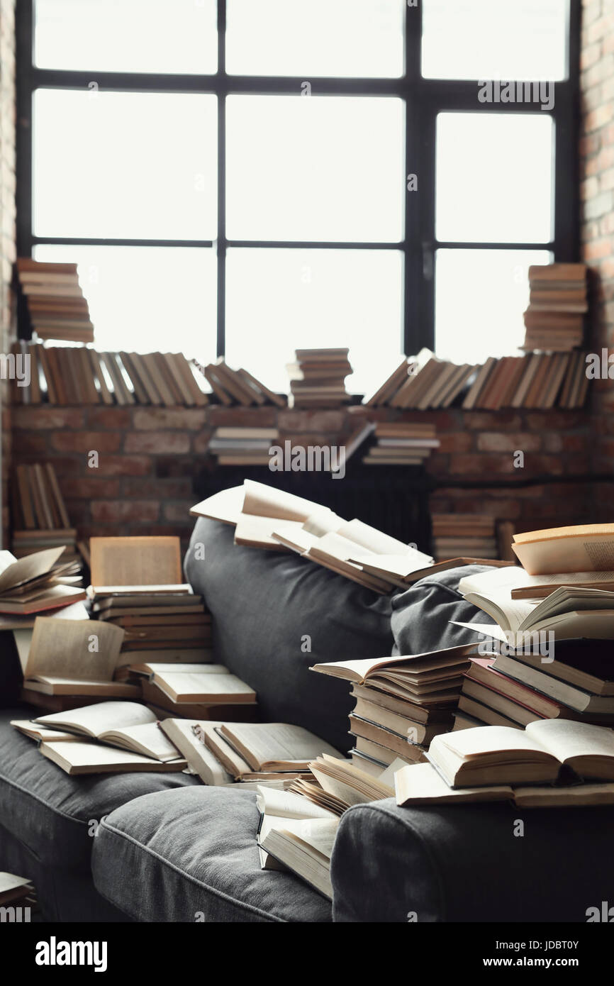 Library. Pile of books indoor Stock Photo - Alamy