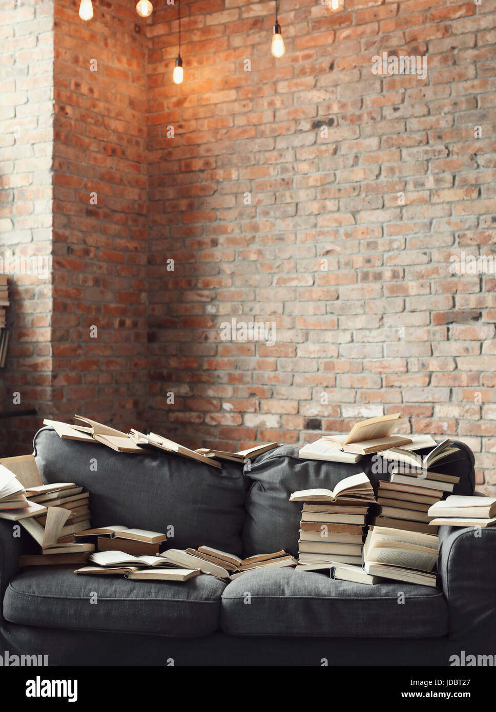 Library. Pile of books indoor Stock Photo - Alamy