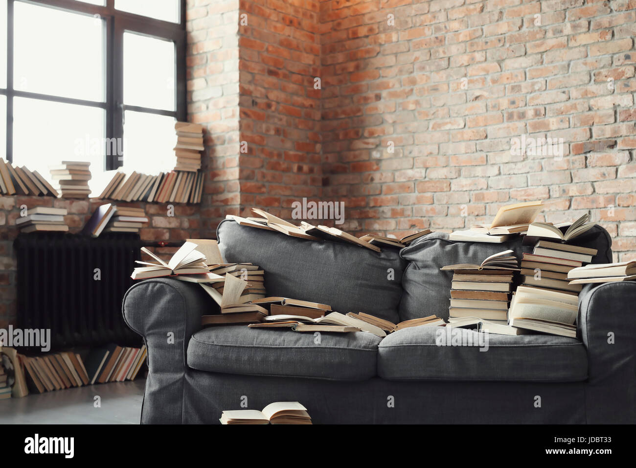 Library. Pile of books indoor Stock Photo - Alamy