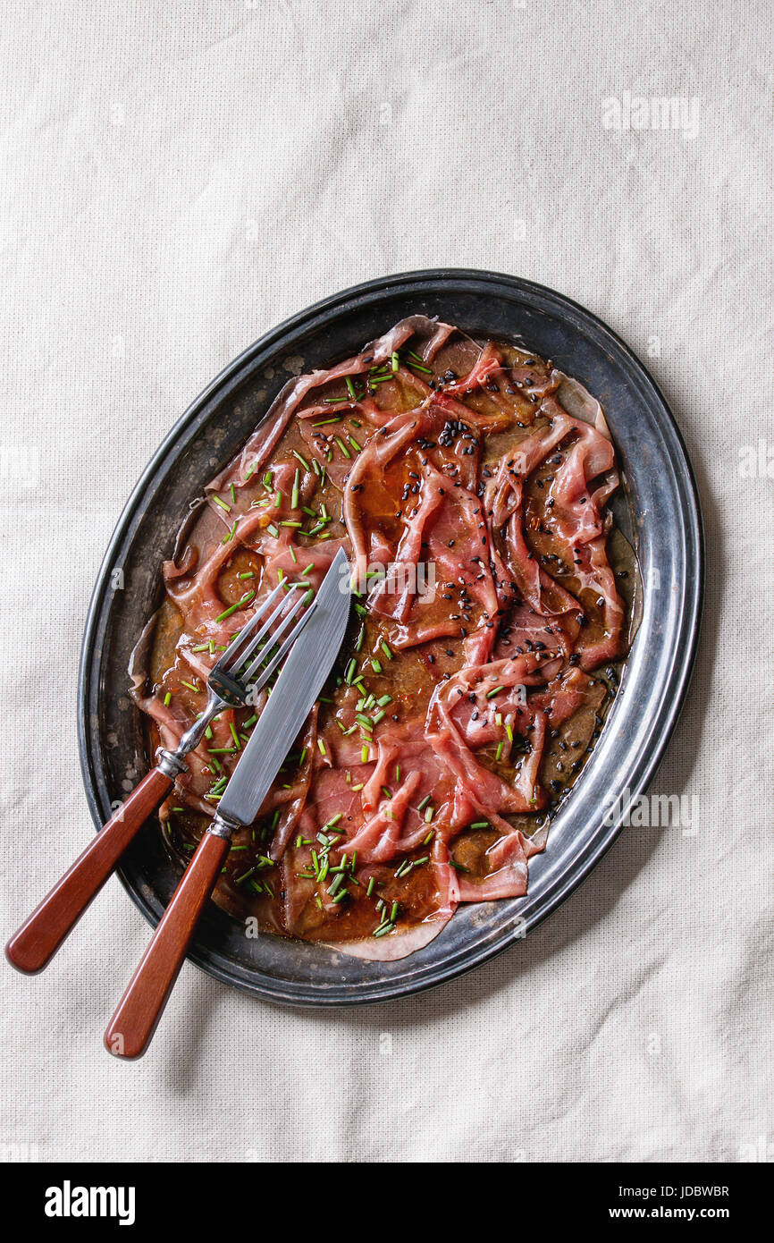 Asian style Beef carpaccio Stock Photo - Alamy