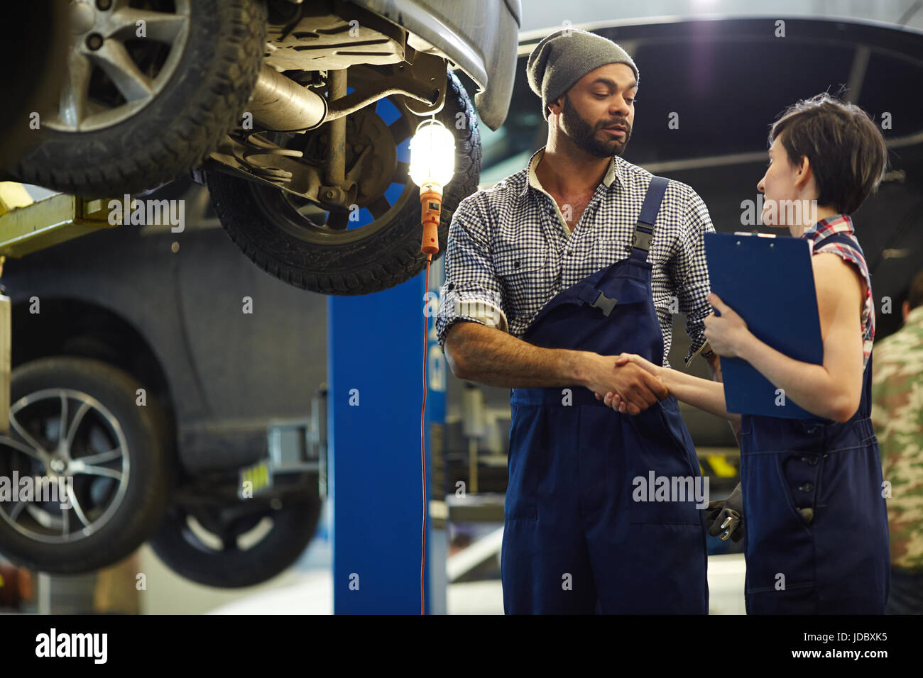 Staff of car service Stock Photo - Alamy