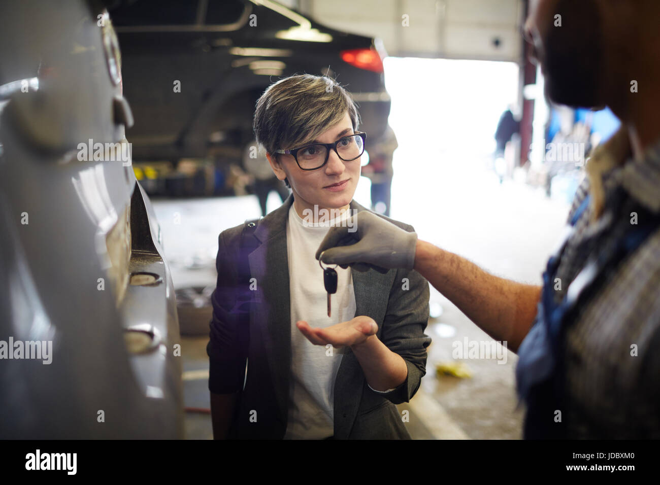 Giving key hi-res stock photography and images - Alamy