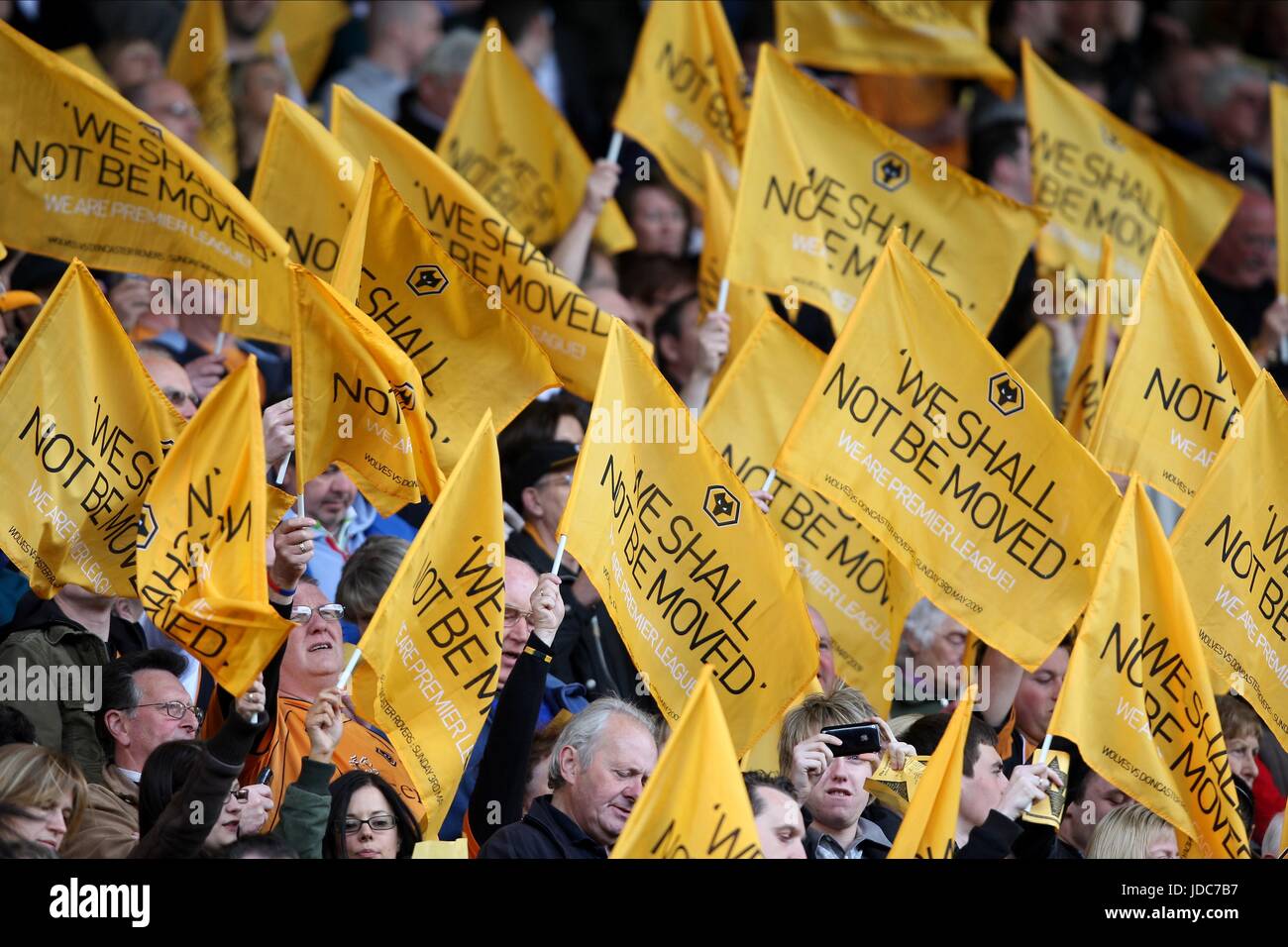 WOLVES FANS WAVE FLAGS WOLVERHAMPTON WANDERERS FC MOLINEUX STADIUM ...