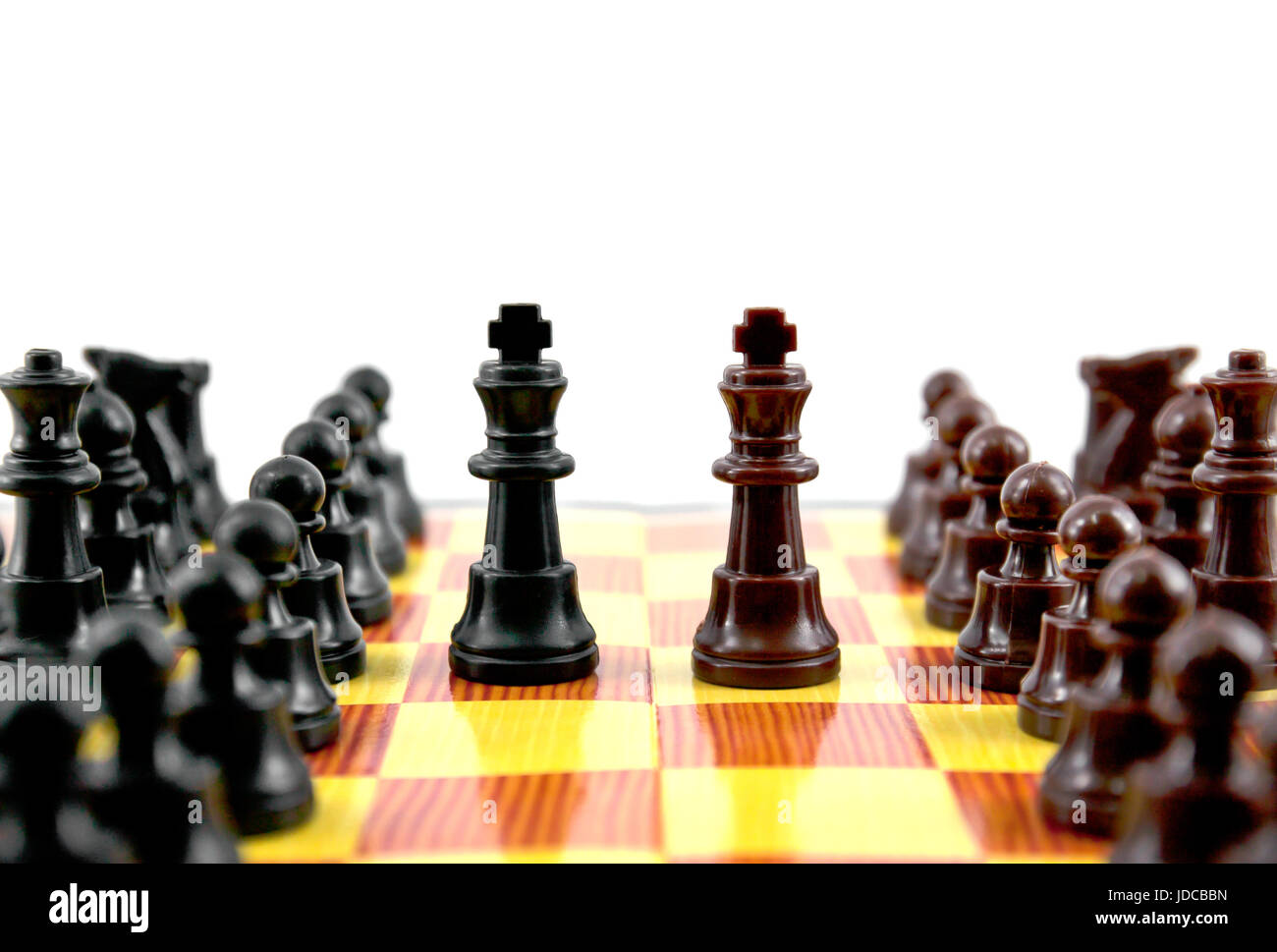 Chess pieces on chess board fallen hi-res stock photography and images ...