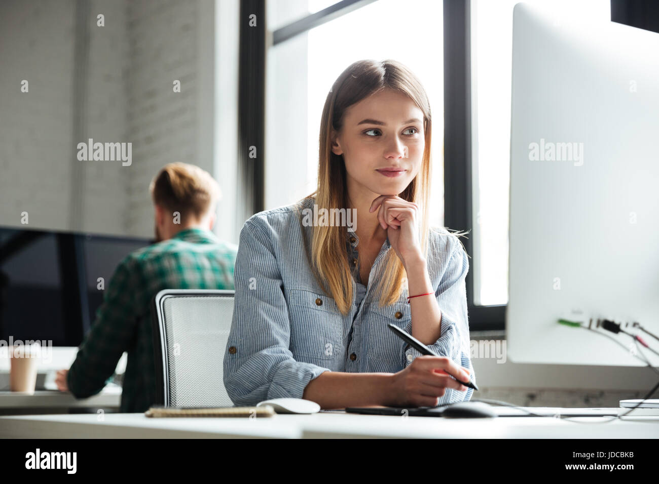 Photo of concentrated young woman work in office using computer and ...