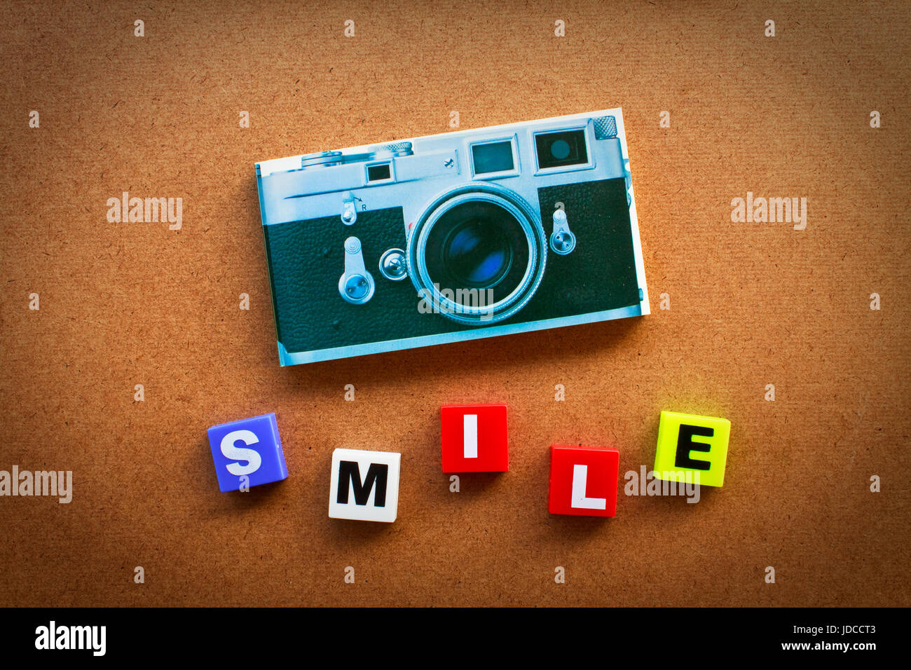 alphabet and camera made by plastic on wood board,for you Stock Photo ...