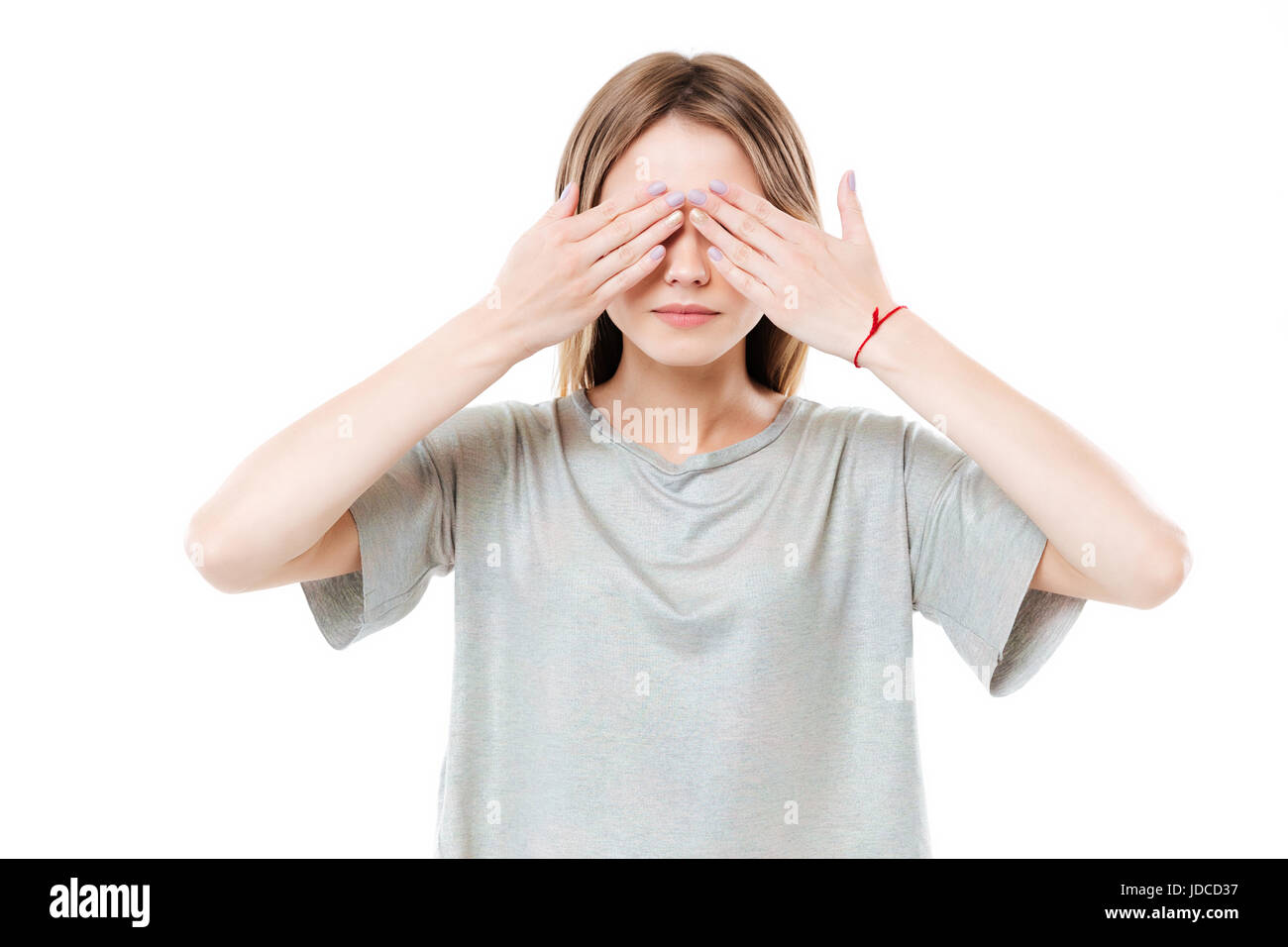 Girl hiding face two hands hi-res stock photography and images - Alamy