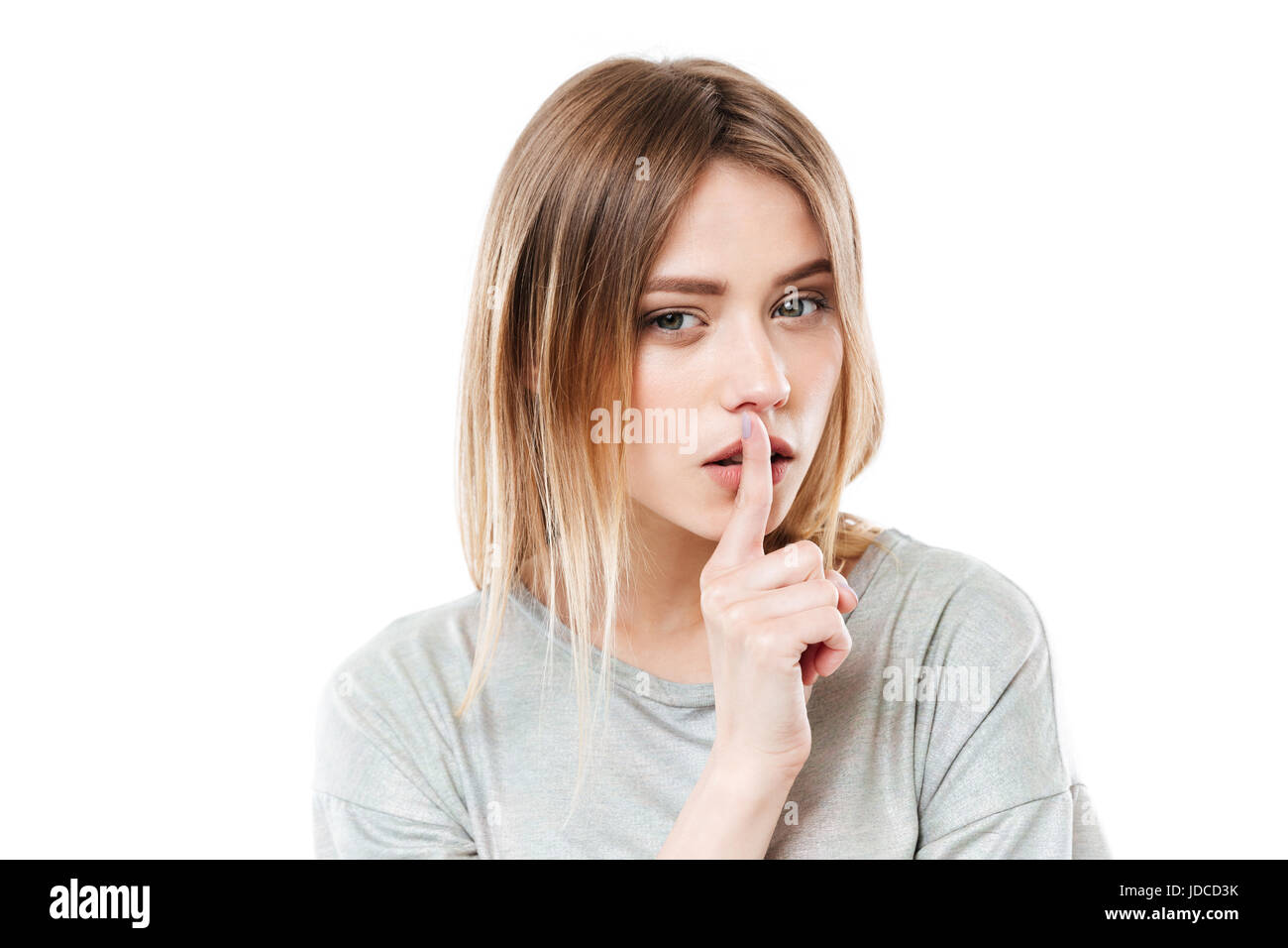 Image of amazing serious lady standing isolated over white background ...