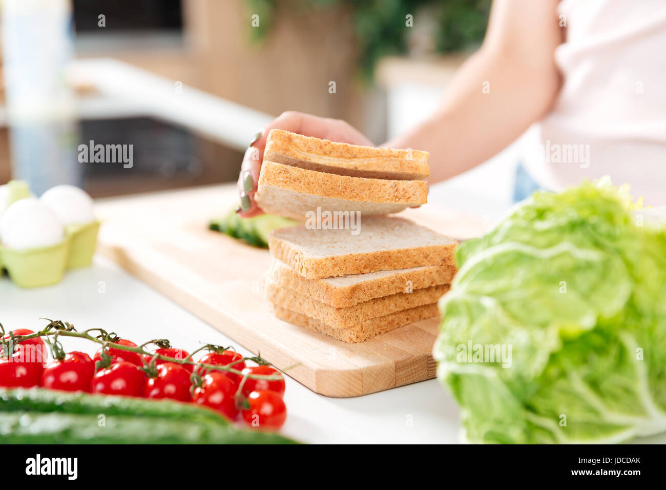 Making a sandwich woman hands hi-res stock photography and images - Alamy