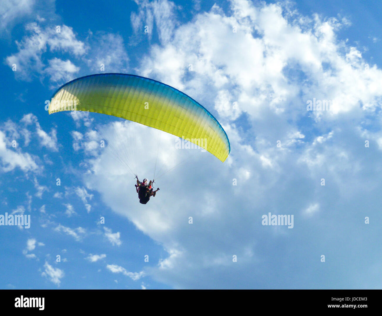 Paragliding free flying in the sky Stock Photo - Alamy