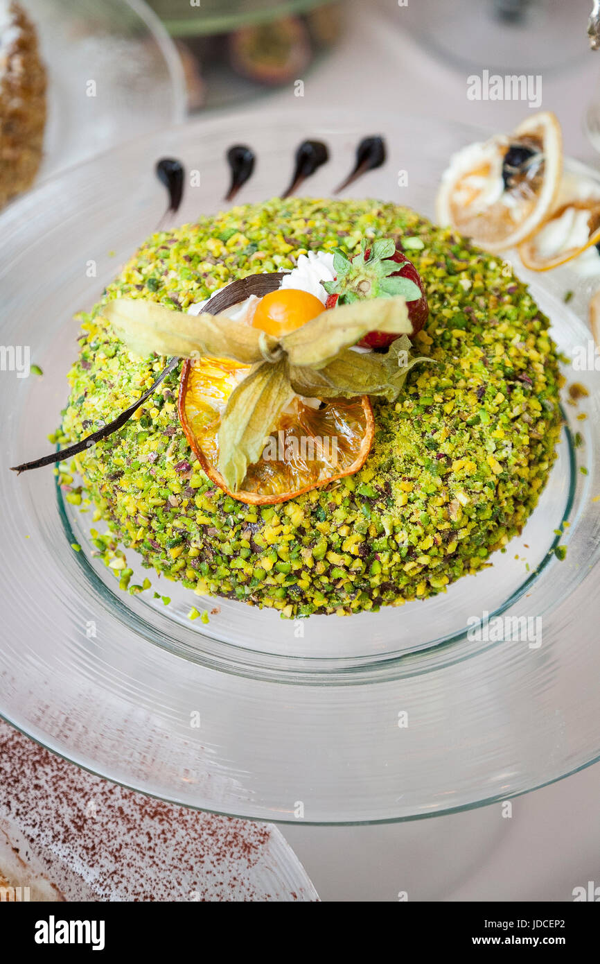 Party cake with crashed pistachio nuts Stock Photo - Alamy