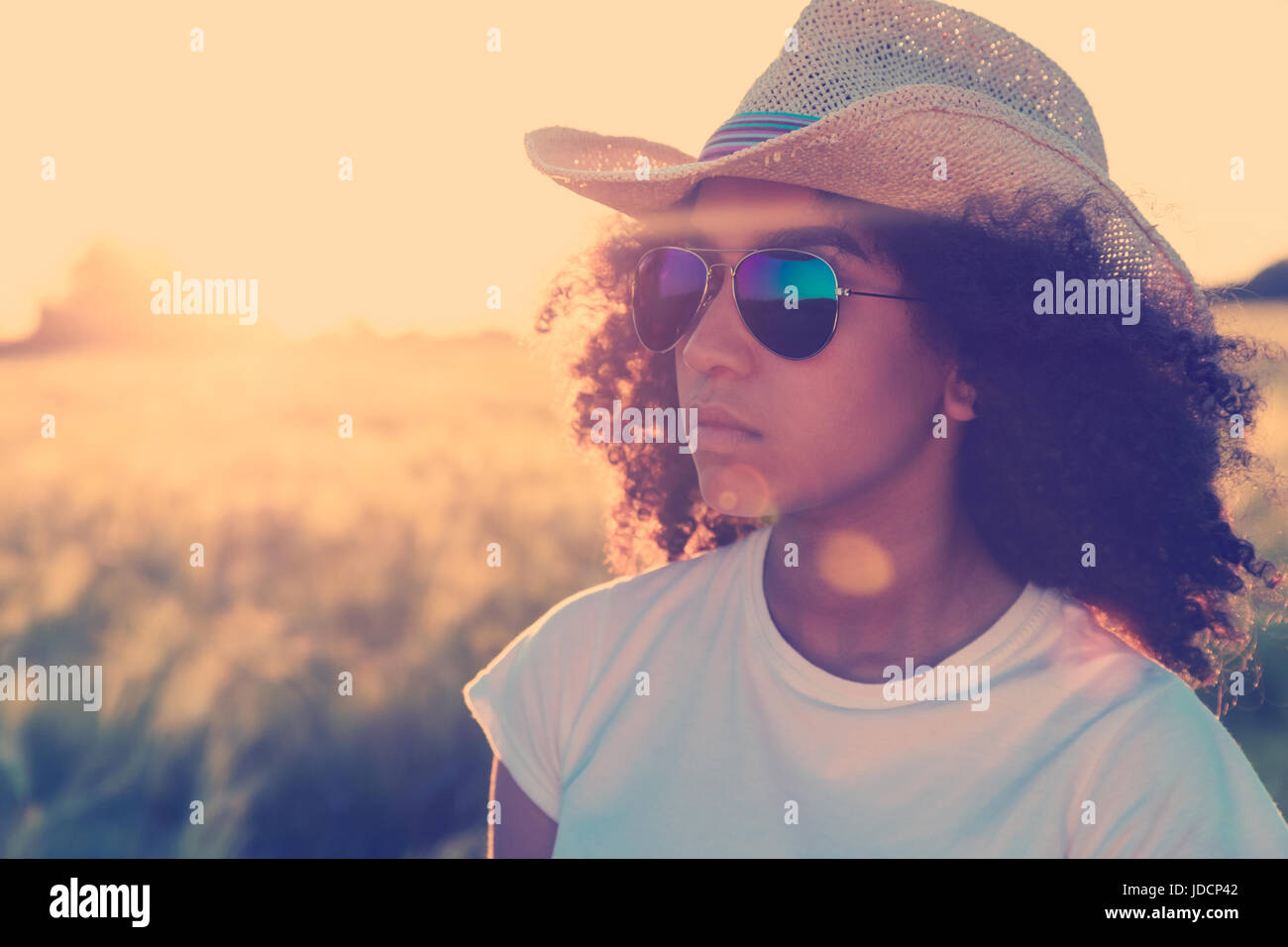 Instagram filter style photo of beautiful happy mixed race African ...