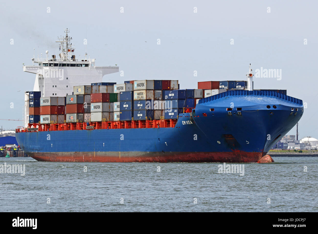 The container ship EM KEA leaves the port of Rotterdam Stock Photo - Alamy
