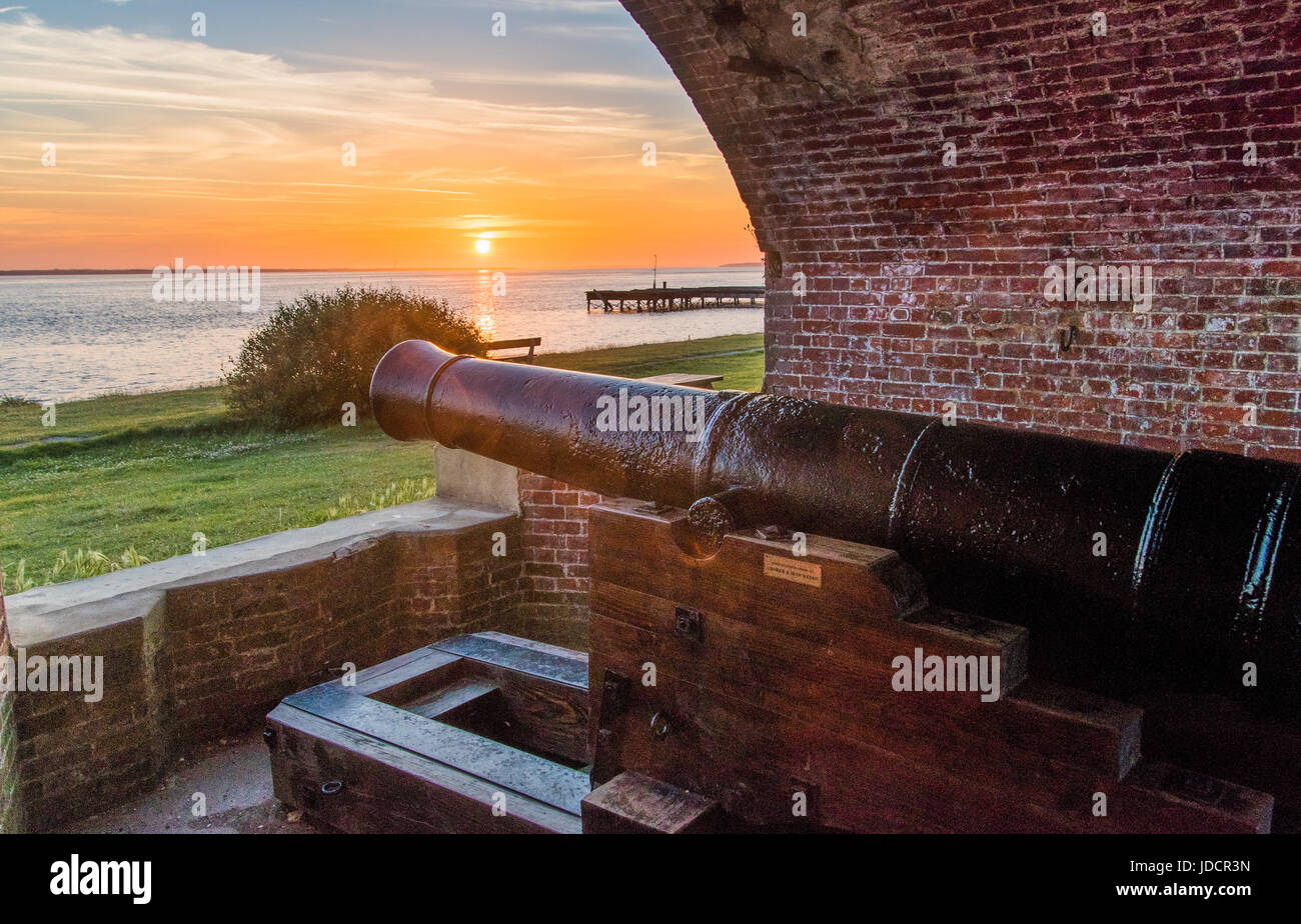 Sunrise over canon at Fort Victoria yarmouth isle of wight Stock Photo ...