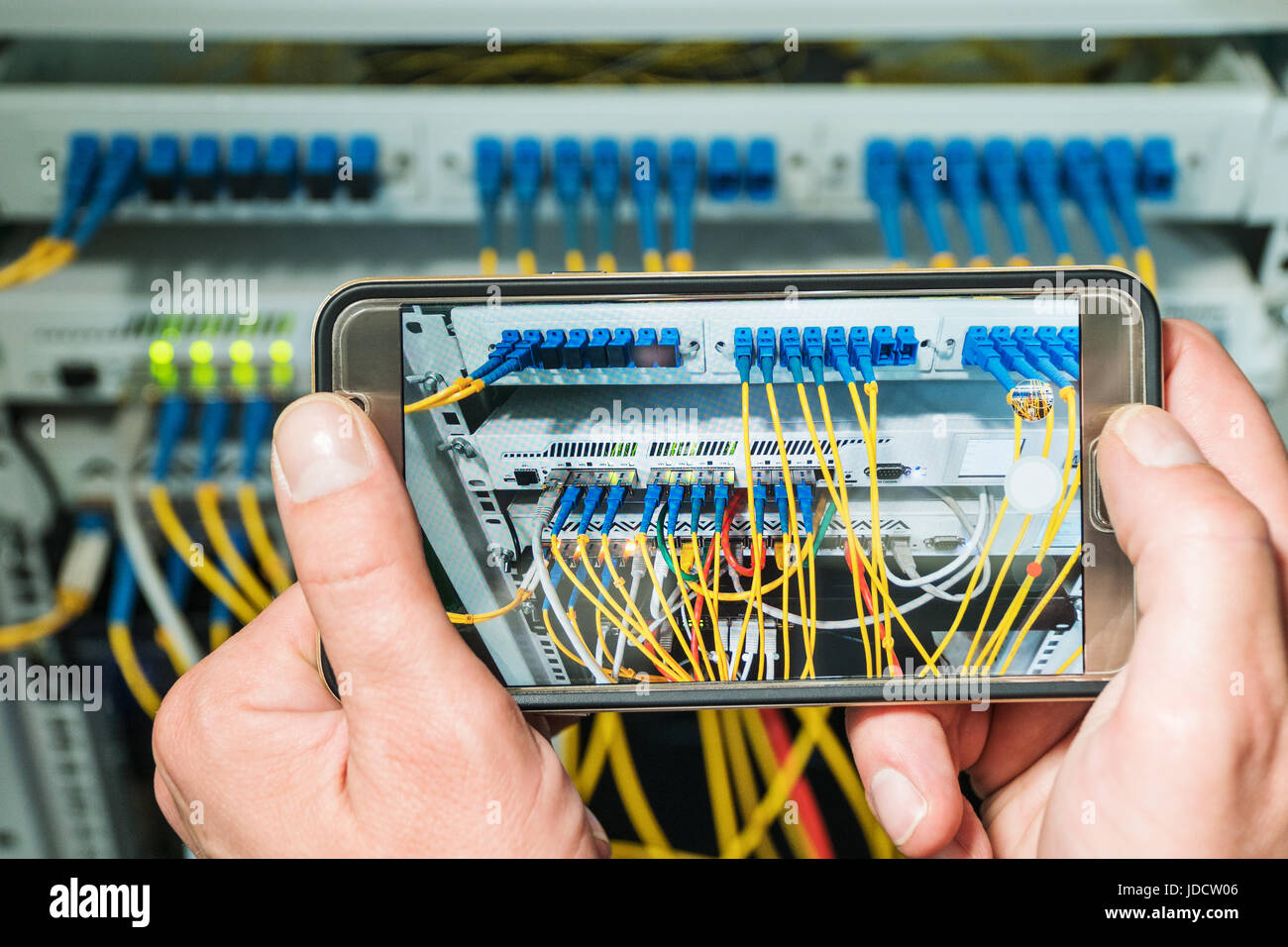 Hands ethernet cable router hi-res stock photography and images - Alamy