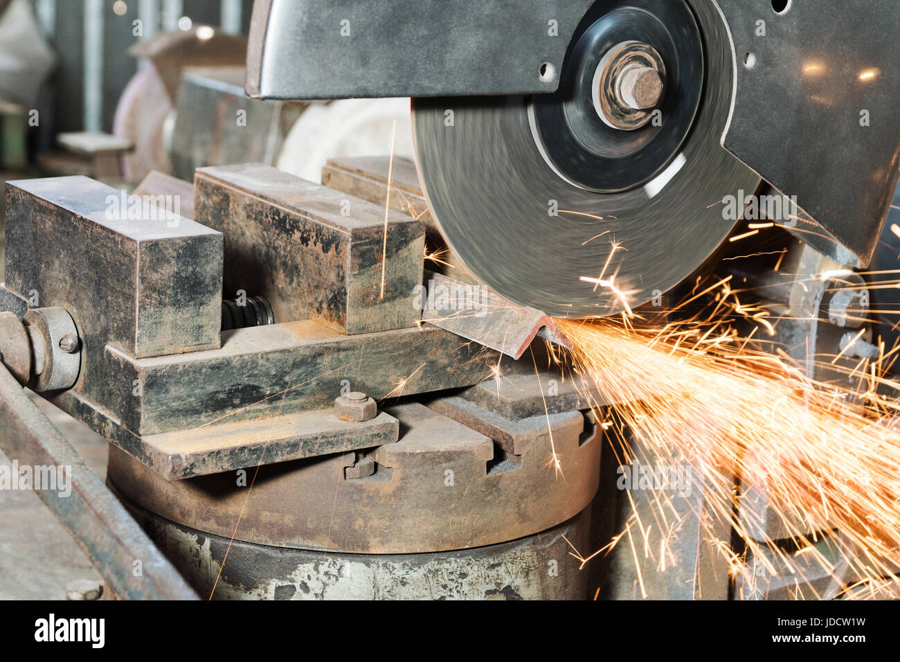 Circular cutting disc cuts off part of the metal corner, close-up Stock ...