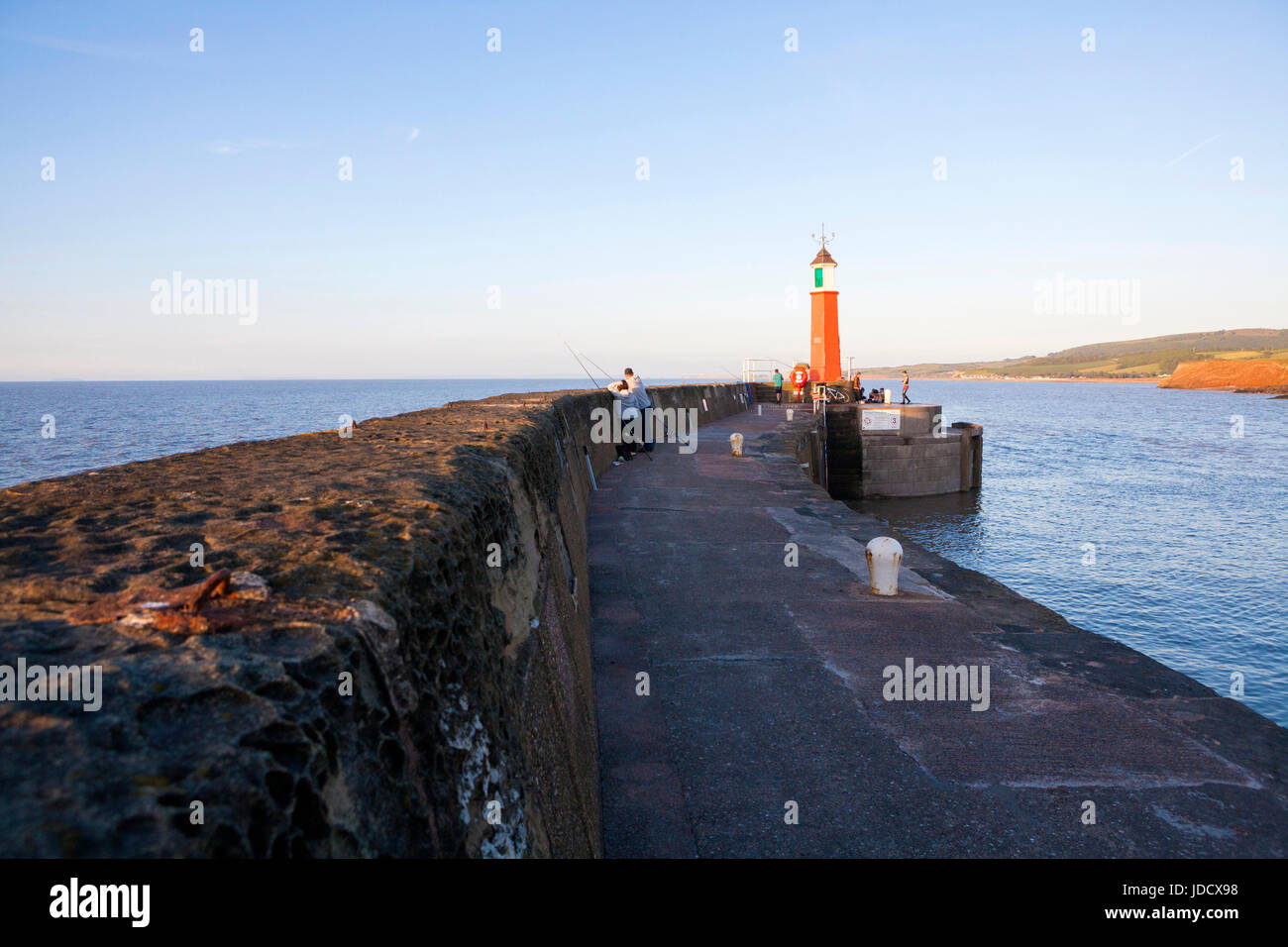 Watchet Harbour and Red lighthouse. The harbour entrance at Watchet on ...