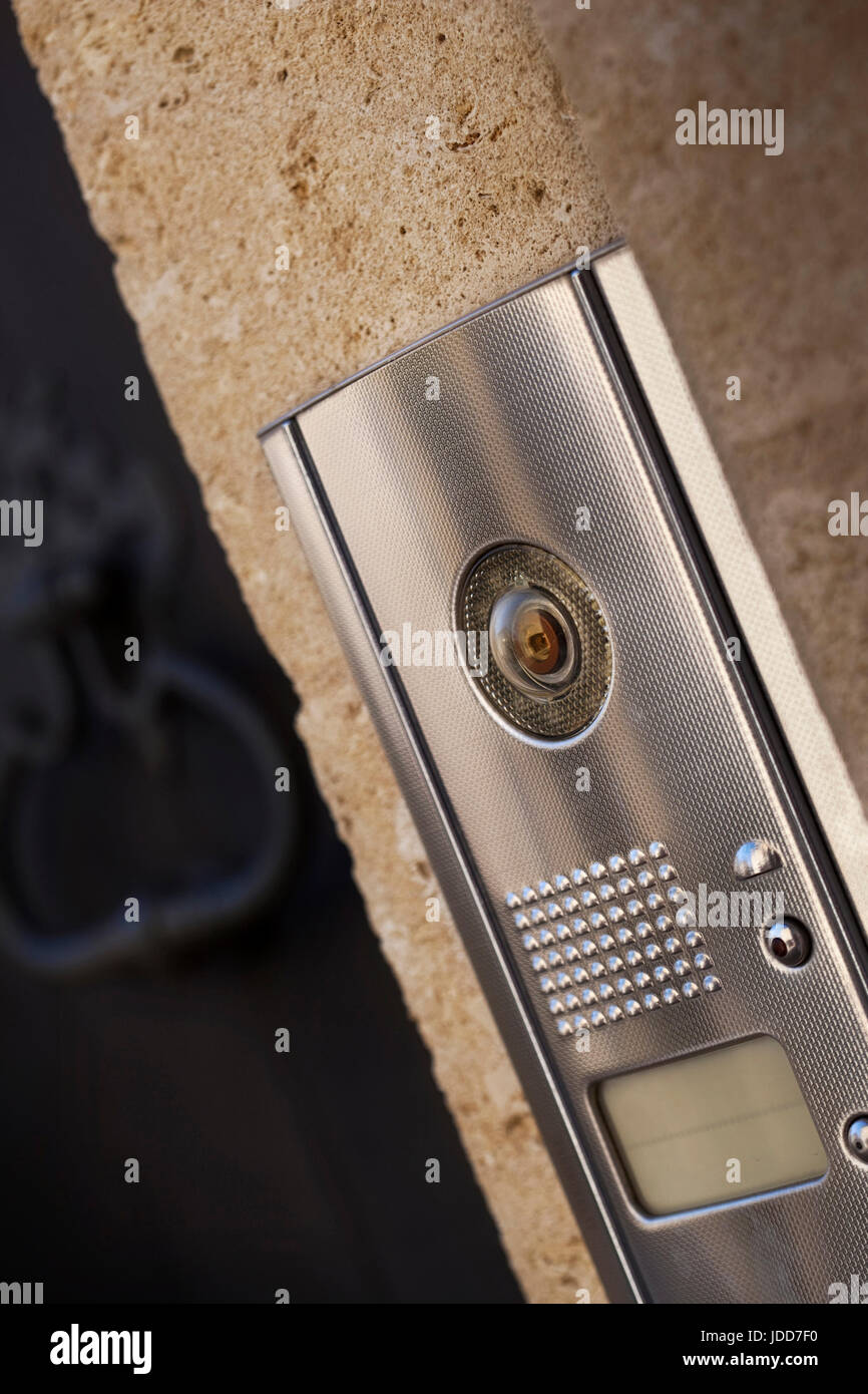 Modern intercom on a stoned wall Stock Photo - Alamy