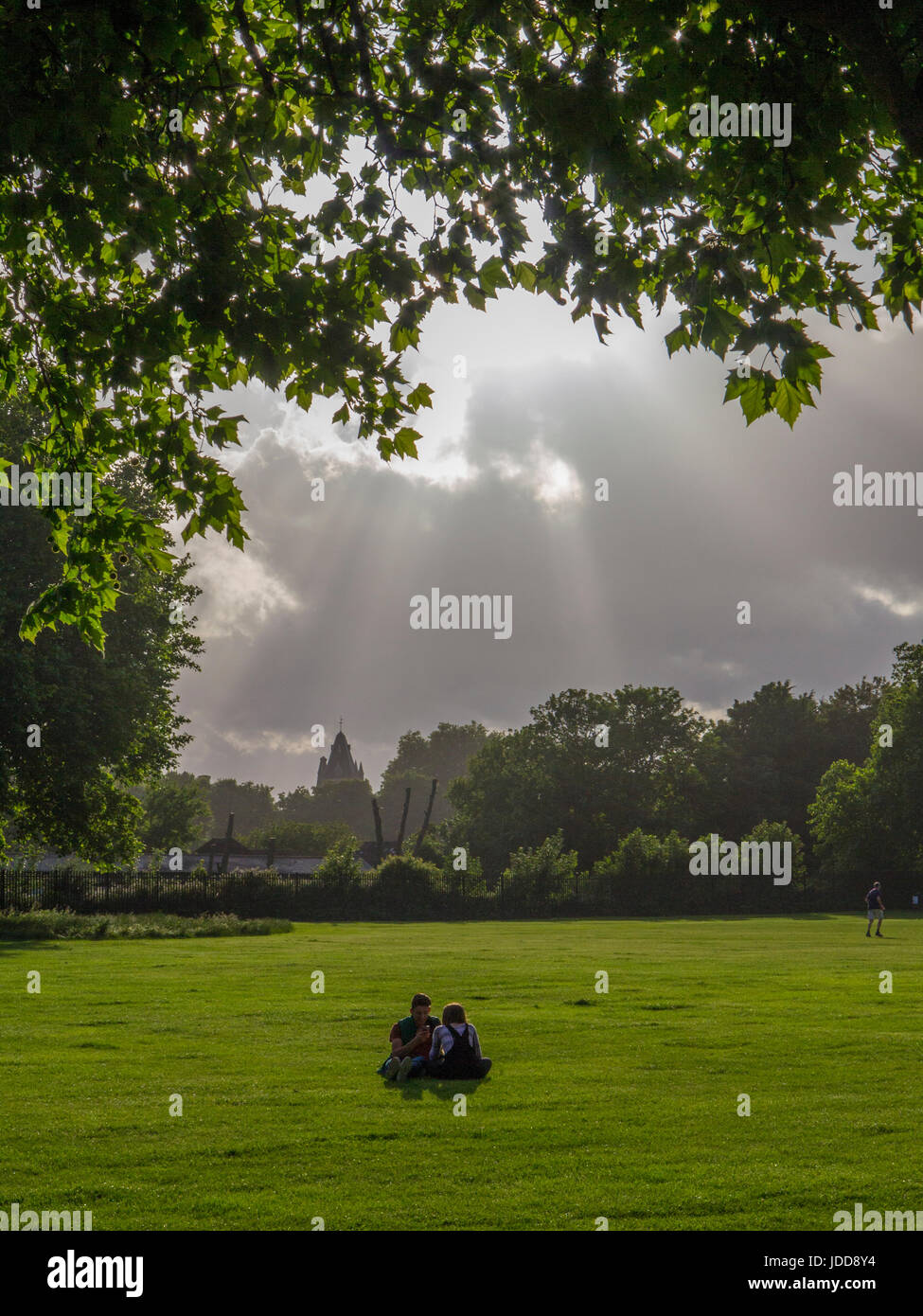 Relaxing in a London park Stock Photo - Alamy
