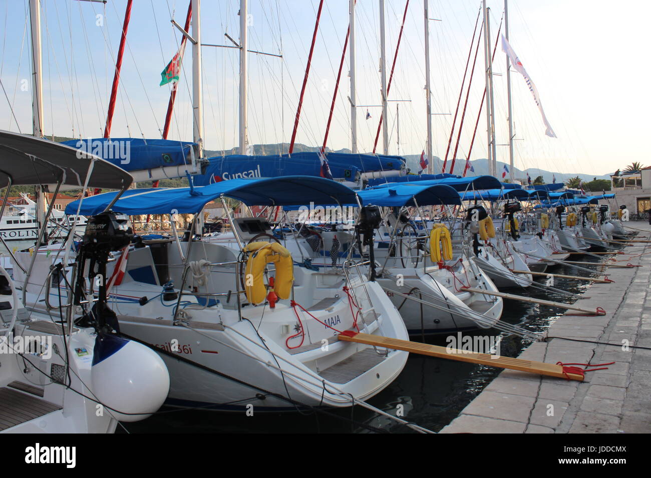 Sunsail flotililla of ten yachts berthed in Jelsa on Hvar, Croatia ...