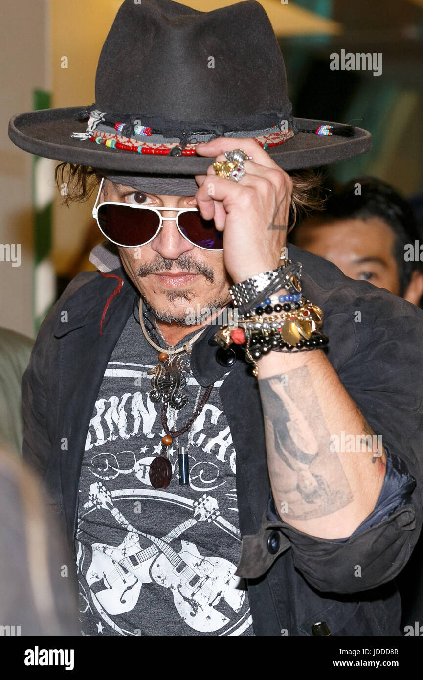 American actor Johnny Depp arrives at Tokyo International Airport on ...
