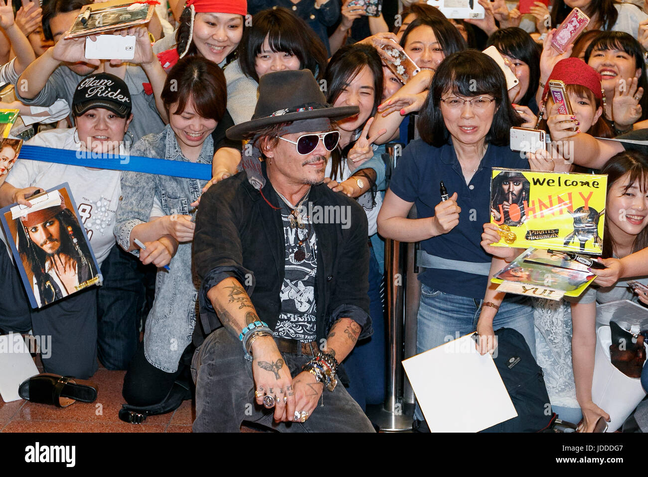 American actor Johnny Depp poses for cameras with fans upon his arrival ...