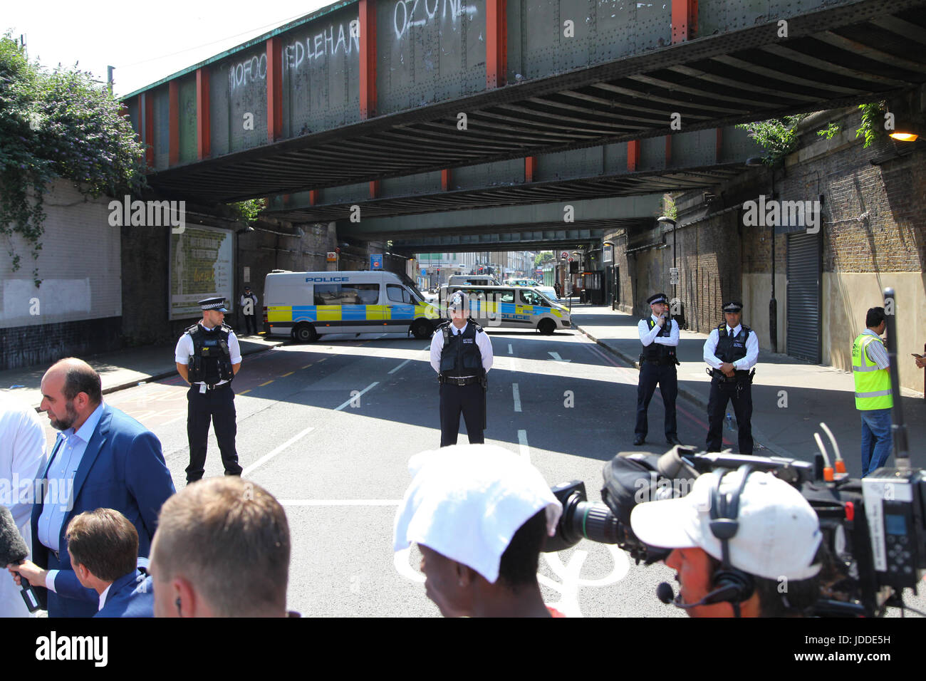 London, UK. 19th June, 2017. Police cordon off area under the bridge ...