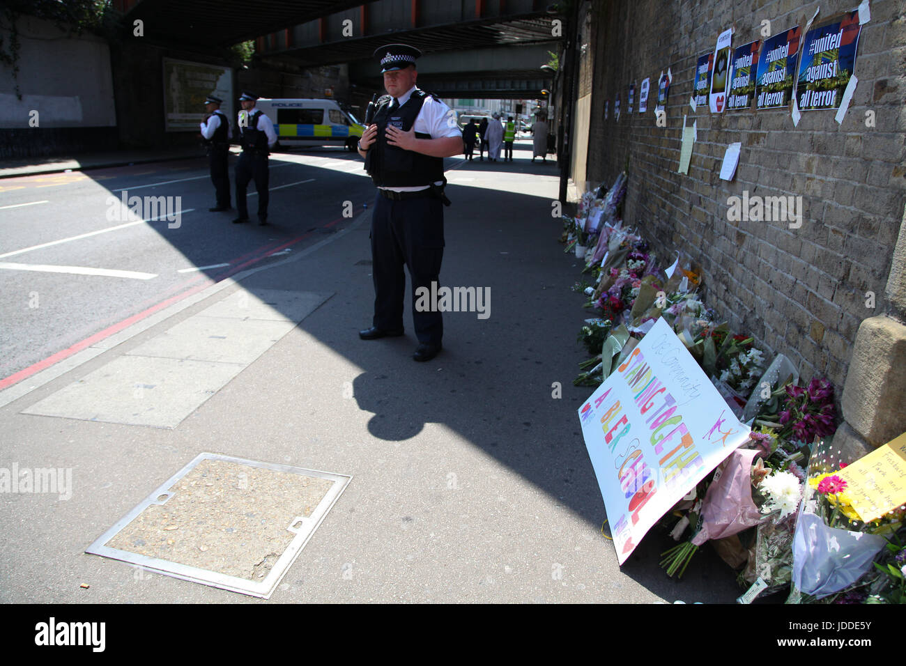 London, UK. 19th June, 2017. Police cordon off area under the bridge ...