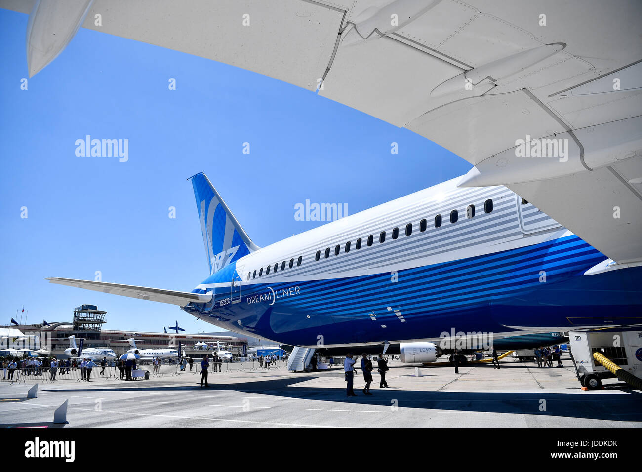 Paris, France. 19th June, 2017. People walk past a Boing 787-10 ...