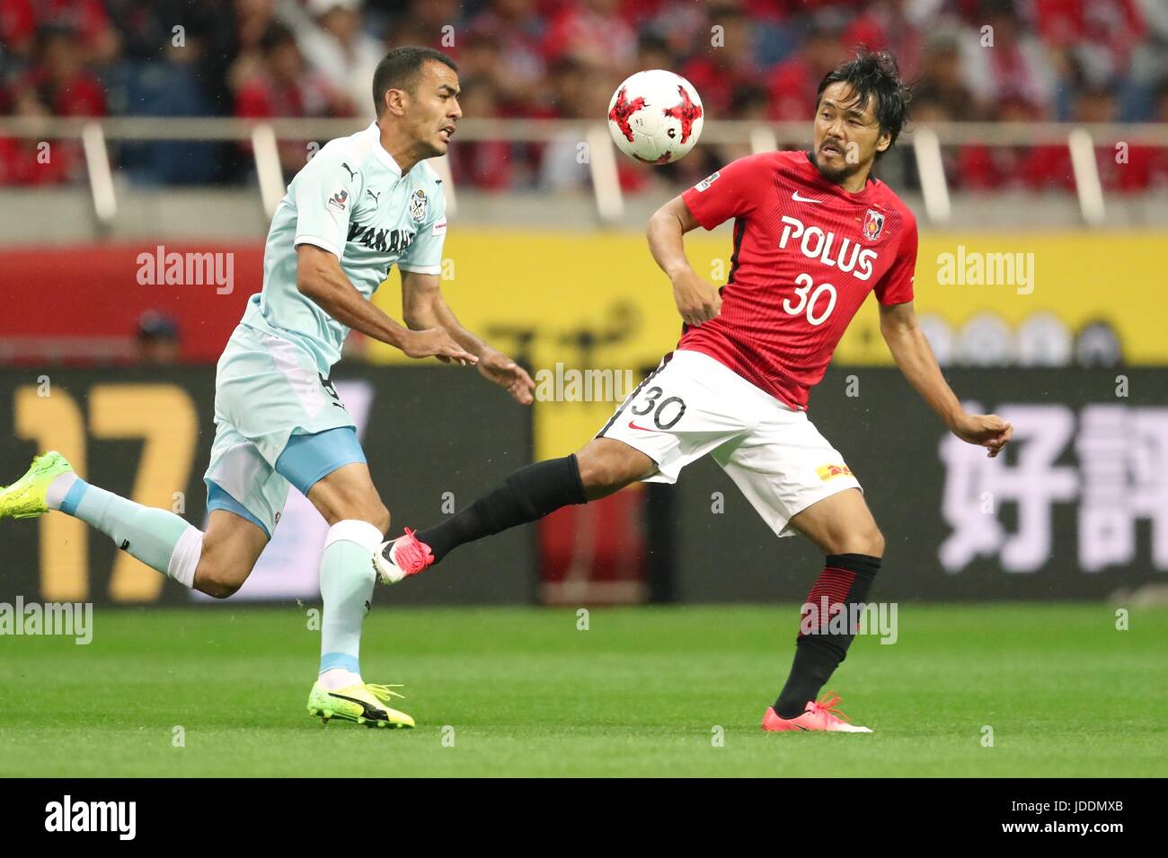 Saitama, Japan. 18th June, 2017. Fozil Musaev (Jubilo), Shinzo Koroki ...