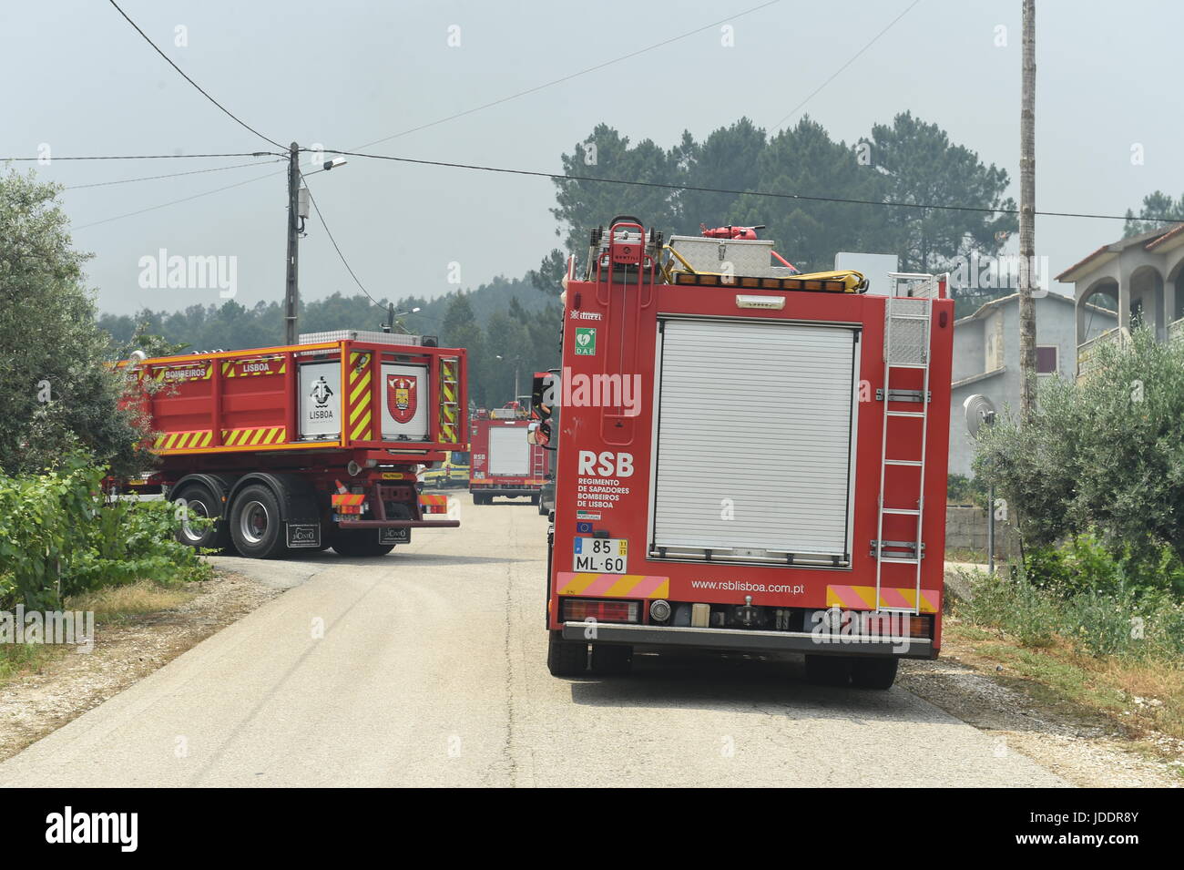 Pedrogao Grande, Portugal. 19th June, 2017. Fire trucks drive toward ...