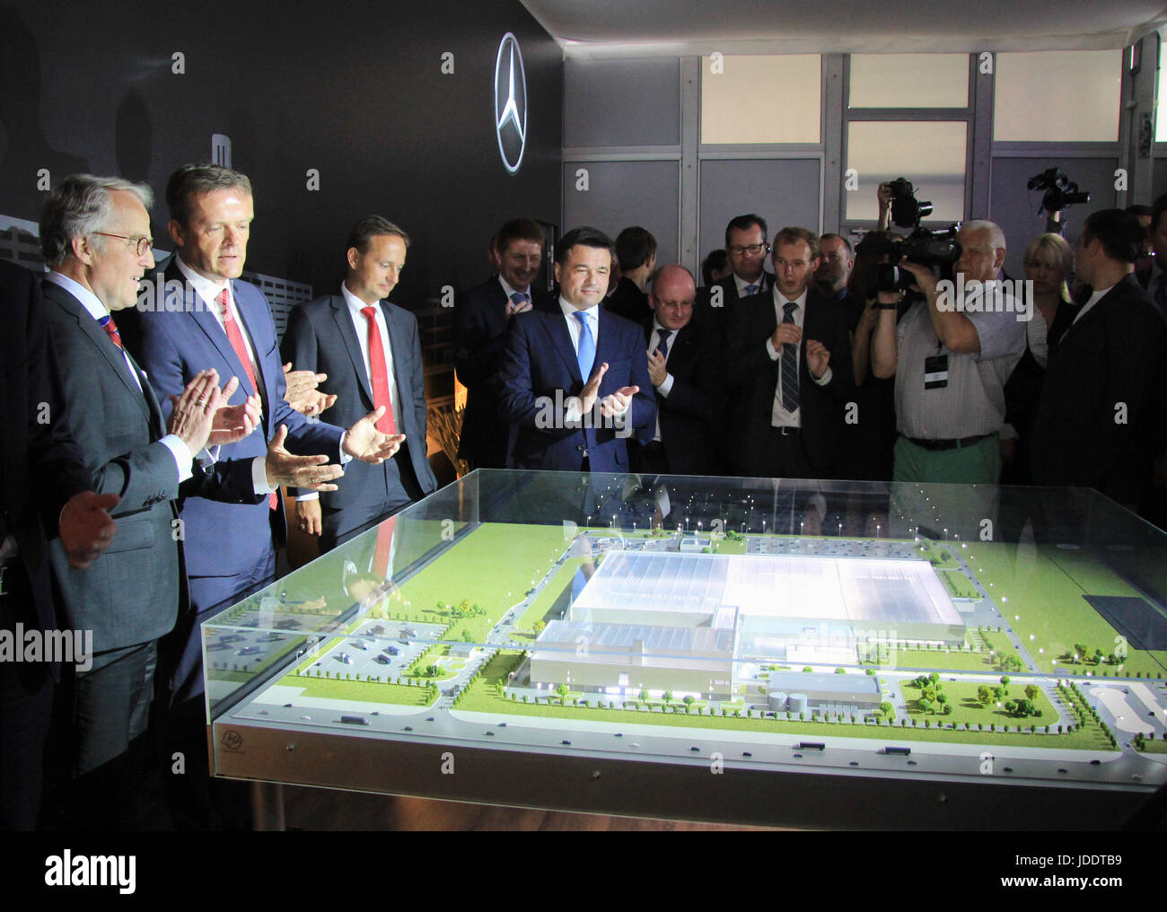 Markus Schafer (2nd from left), from Mercedes-Benz Cars, and his guests ...