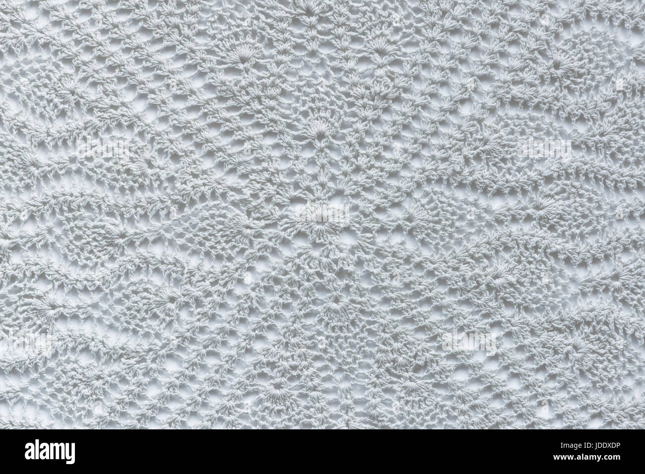 White crochet fabric - background and texture Stock Photo - Alamy