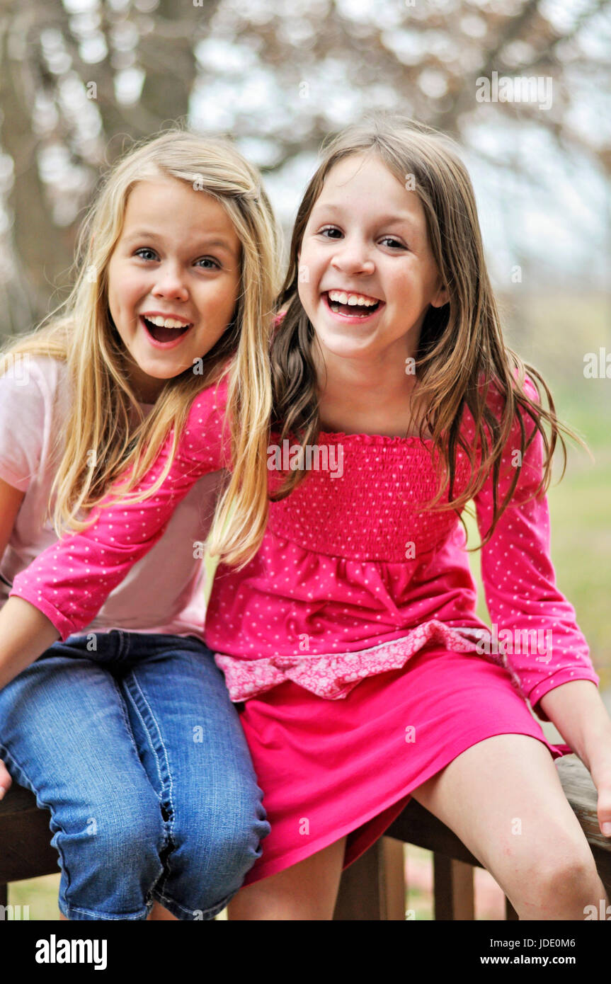 Two pre teen girls laughing hi-res stock photography and images - Alamy